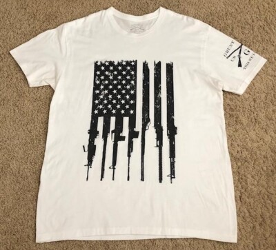 Grunt Style American Flag Guns This We'll Defend Men's White T-Shirt ...