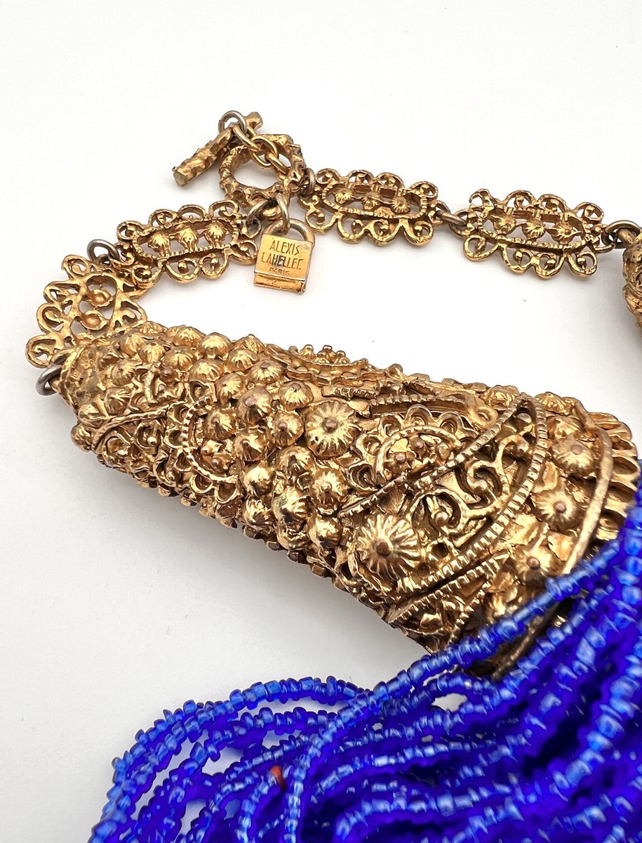 Vtg Alexis Lahellec Paris Gold Tone Molded Blue Glass Twist Vtg Alexis Lahellec Paris Gold Tone Molded Blue Glass Twist