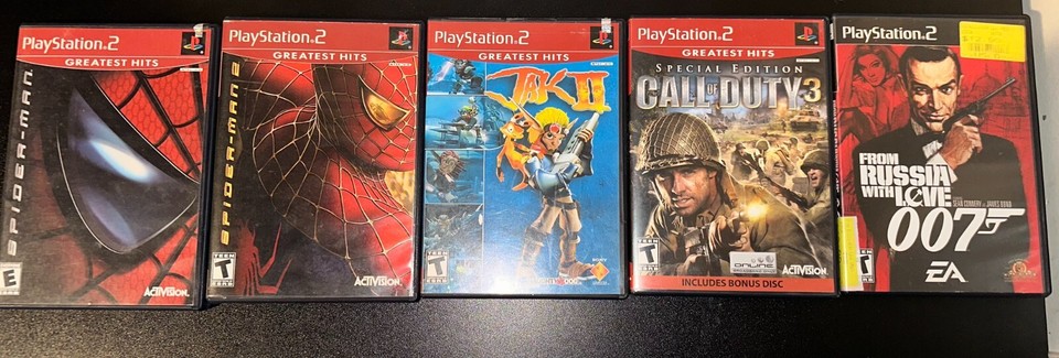 PS2 Slim (Untested) bundle with 13 PS2 Games and 1 PS1 Game. Info in ...