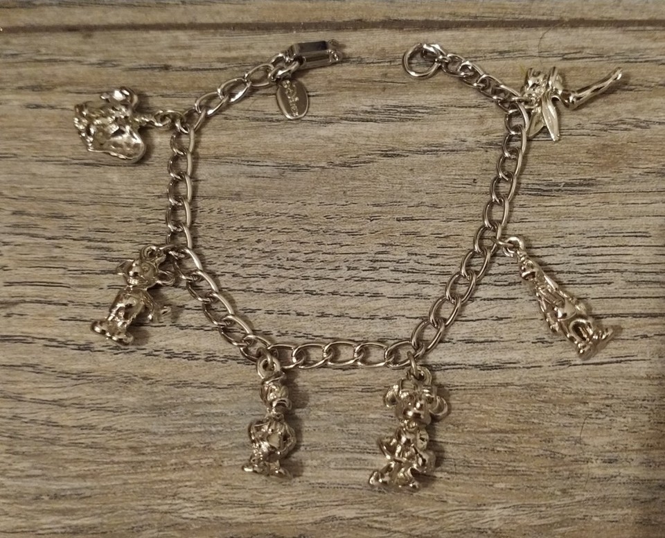 Walt Disney Characters Charm Bracelet tagged Mickey Mini Mouse Dumbo ...
