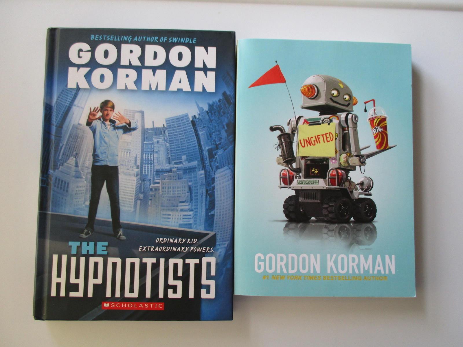 LOT of 2 Gordon Korman books UNGIFTED / THE HYPNOTISTS hard cover soft ...