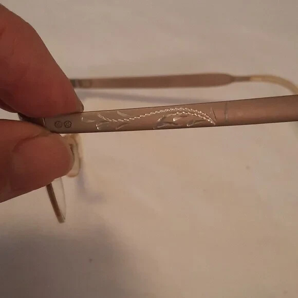 1950s cat eyes glasses frames. Labeled: 4 1/2 ALUM - Gem