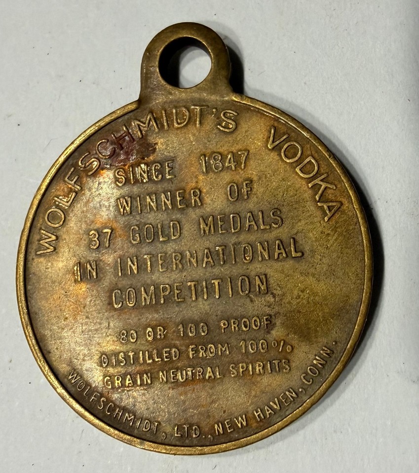 vintage 1800's? token WOLFSCHMIDT'S VODKA New Haven CT (winner 31 gold ...