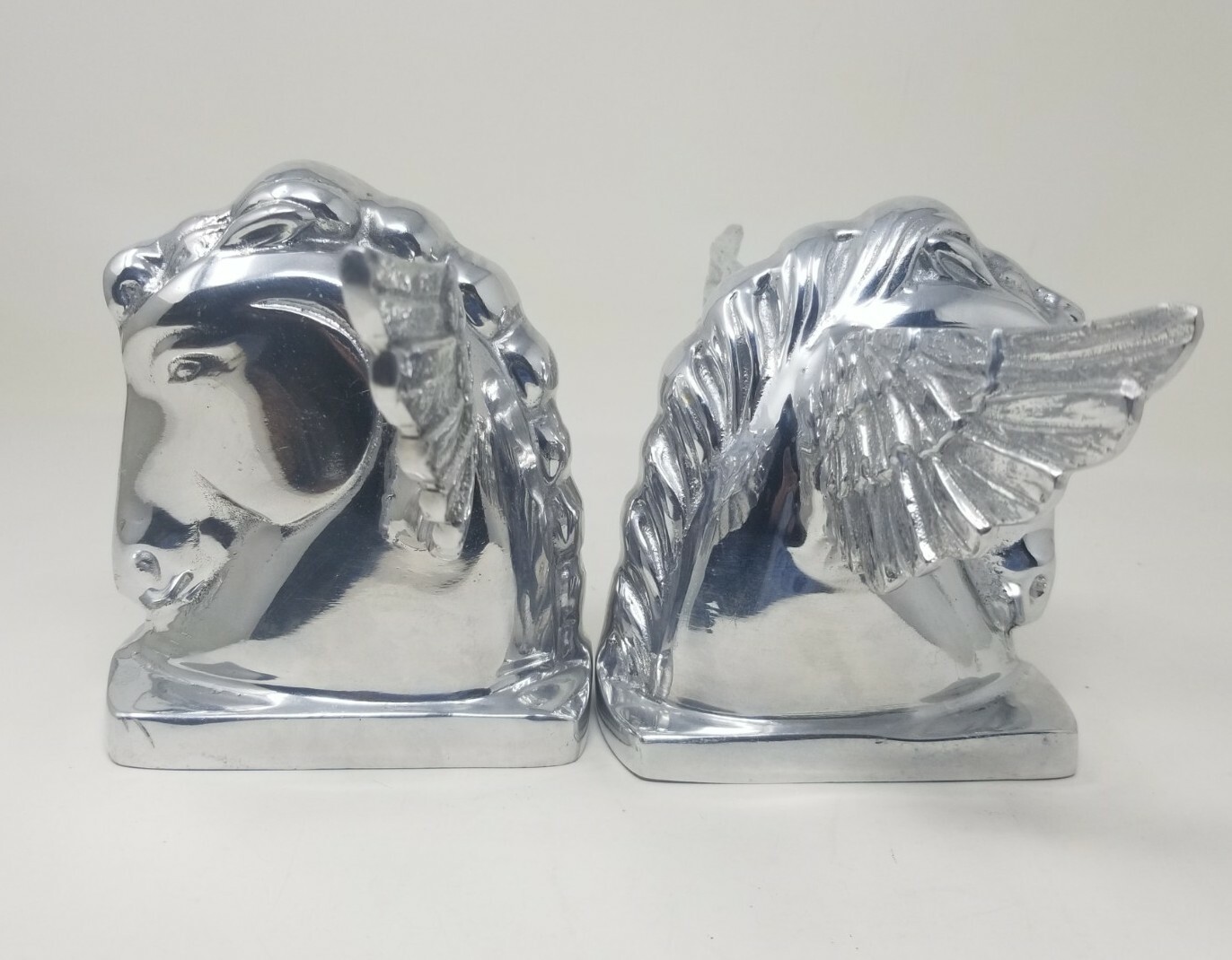 Nima Oberoi Lunares San Francisco Polished Aluminum Pegasus Bookends | eBay