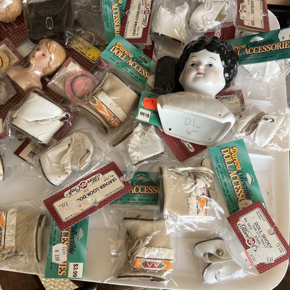 2 ceramic doll heads,doll shoes,lots of items some shoes have stains ...