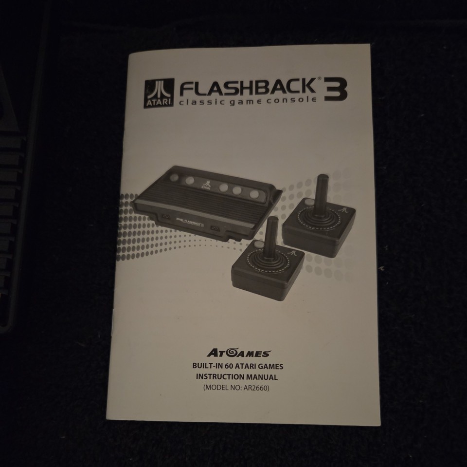Atari Flashback 3 Classic Game Console with power cord and owners ...