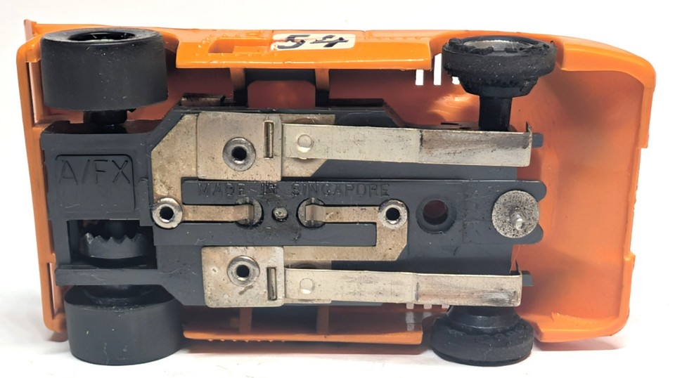 1971 Aurora AFX McLaren Auto World Can-Am #54 Slot Car with wing. Runs ...