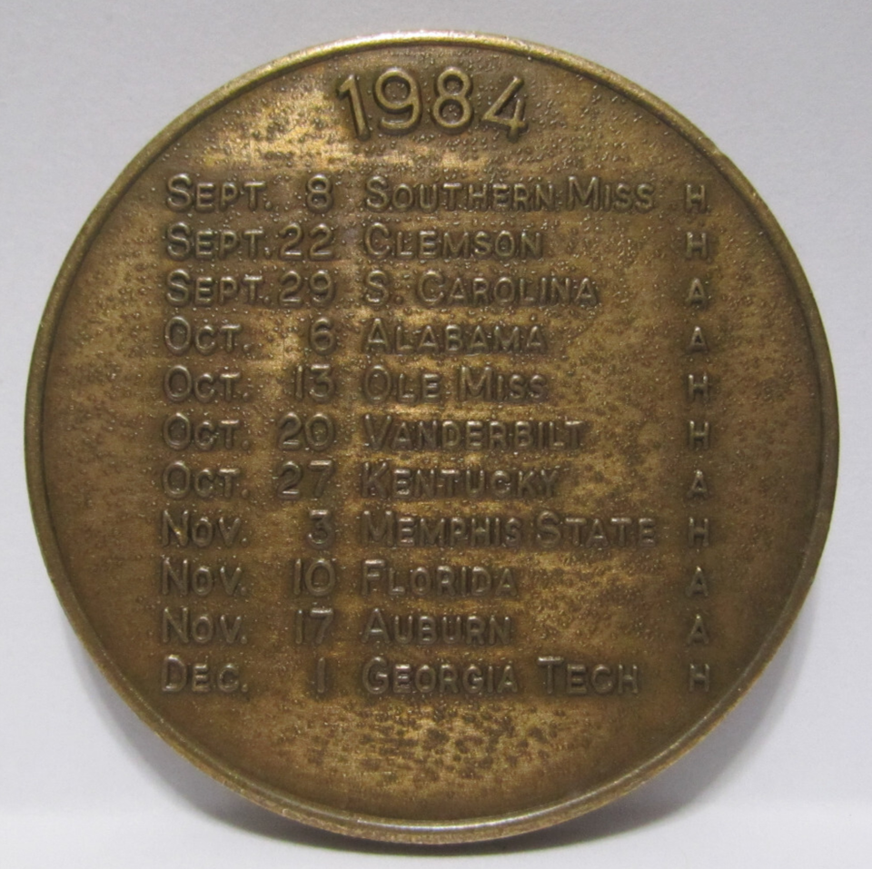 UGA UNIVERSITY OF GEORGIA BULLDOGS FOOTBALL 1984 SCHEDULE COIN TOKEN ...