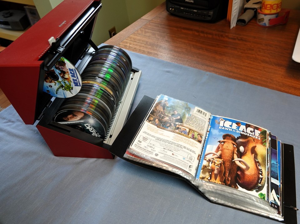 72 DVDs IN DISCGEAR SORTER WITH WRAP-AROUND ART IN DISGEAR FILE BOOK ...