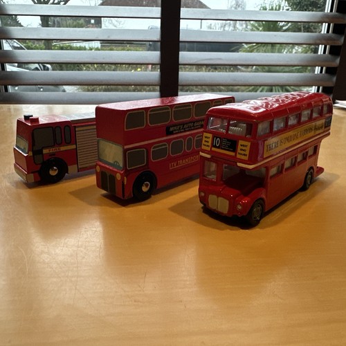 Harrods Red Double Decker Routemaster Bus and a wooden bus and fire ...