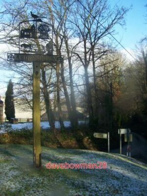 PHOTO LUDDESDOWN VILLAGE SIGN ON GREEN AT JUNCTION OF OAKENDEN ROAD ...