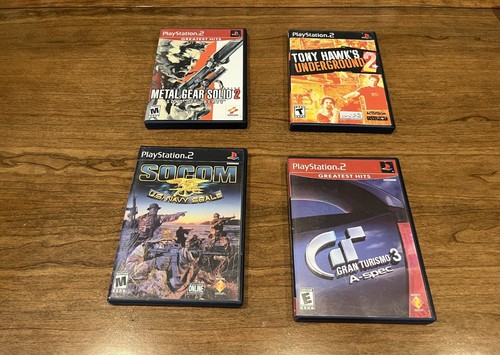 Lot of four Playstation 2 games - CIB - tested - MGS2, GT3, THUG2 ...