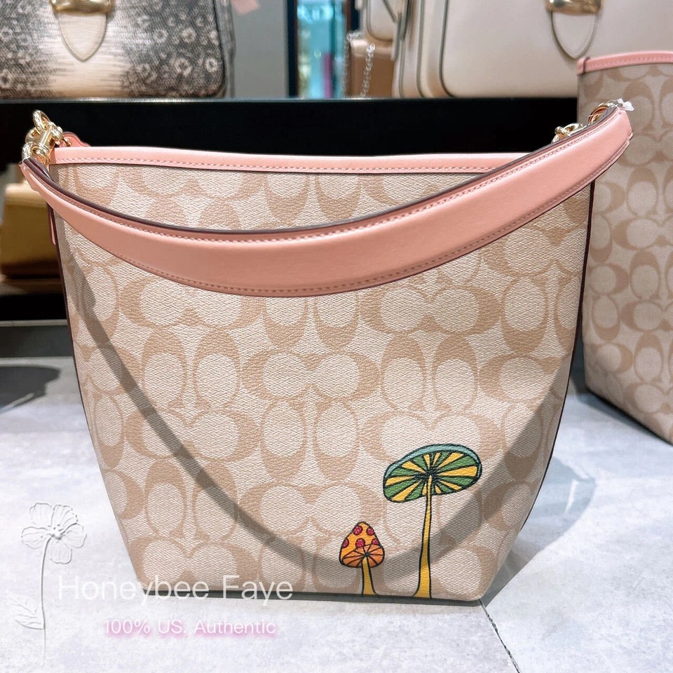 NWT Coach City Bucket Bag In Signature Canvas with bow / floral/shell ...