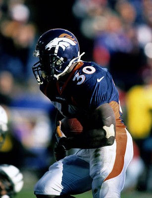 Denver Broncos running back Terrell Davis carries the football Bro- Old ...