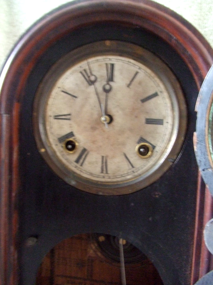 An old INGRAHAM round top clock. It is in very condition = runs X well ...