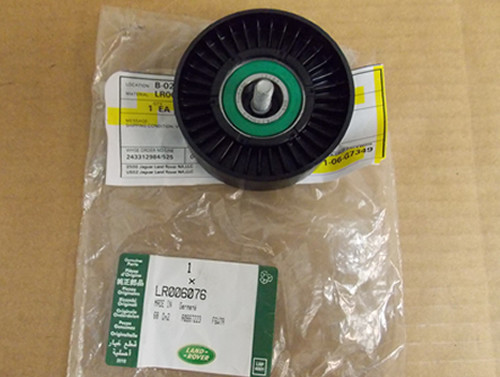 GENUINE LAND ROVER TENSIONER PULLEY LR2 3.2L NEW LR006076 | eBay