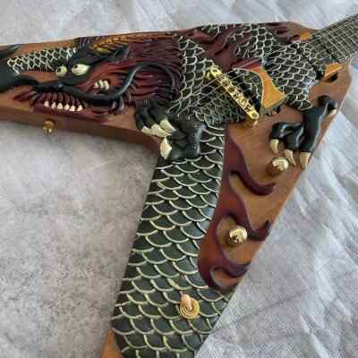 Factory Customized Electric Guitar with 6dragon Shaped Carved Strings ...
