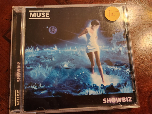 Muse- Showbiz (CD, 1999) in VG shape. Case has a sticker, disc is ...