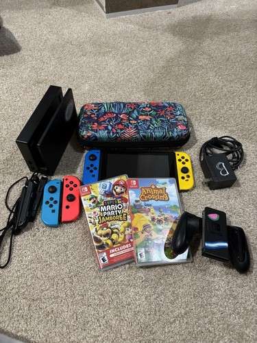 Nintendo Switch Bundle with Extra Controllers Case Games Etc. Read ...