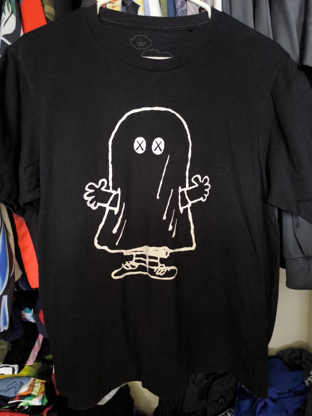 Uniqlo x kaws x peanuts ghost cartoon collab shirt pr… - Gem