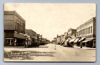 C.1927 RPPC SIBLEY AVE LITCHFIELD MN, J.C. PENNEY, RED OWL, B.F. CO ...