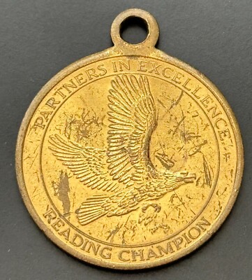 World Book Partners In Excellence Reading Champion Token Necklace | eBay