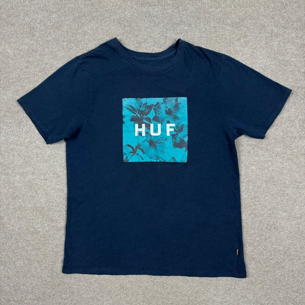 Huf Floral Logo