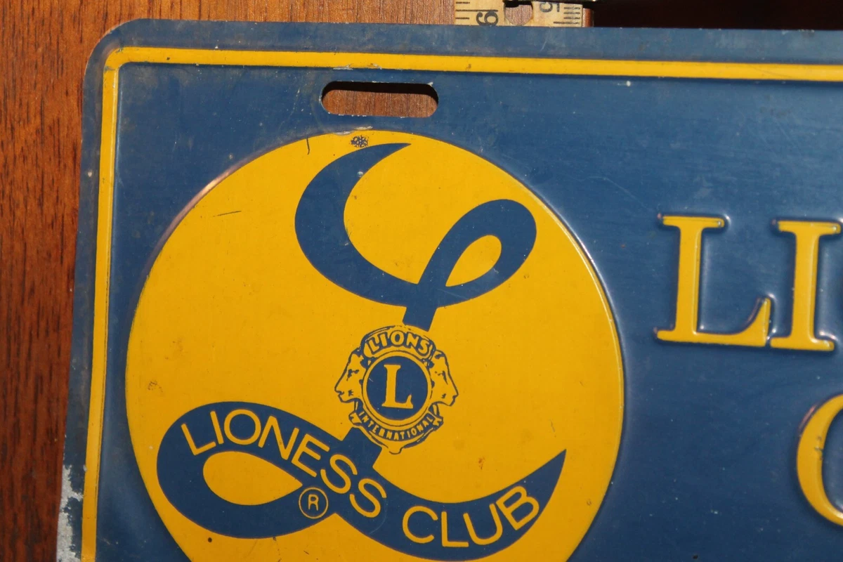 Lions Club We Serve Logo
