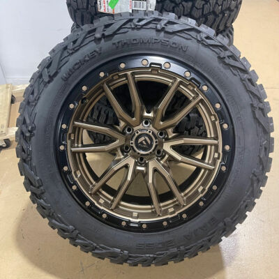 20x10 Fuel Bronze Rebel Wheels 33" Baja Boss AT Tires 8x6.5 Dodge Ram ...