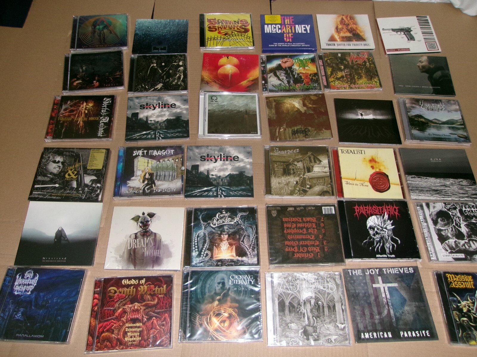 2000 new cds bundle you pick up only metal rock alt. obscure etc ...