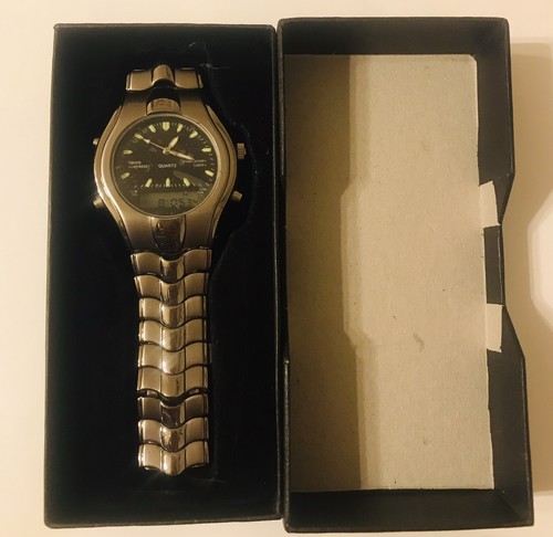 New Eric Chevillard gents watch in box just had 2 new batteries fitted ...