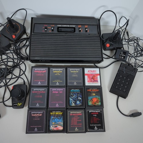 Atari 2600 Console, 12 Games Lot 3 Joy Stick, 2 Paddles, Touch Pad ...
