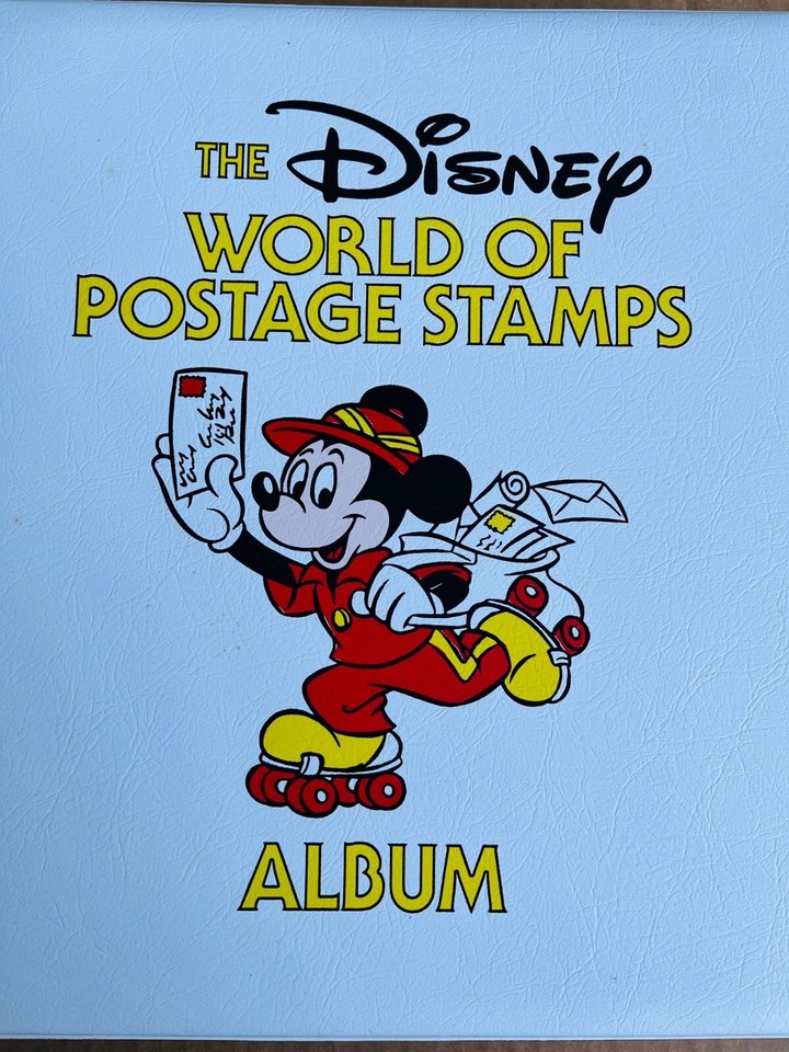 THE DISNEY WORLD OF POSTAGE STAMPS ALBUM NEW | eBay
