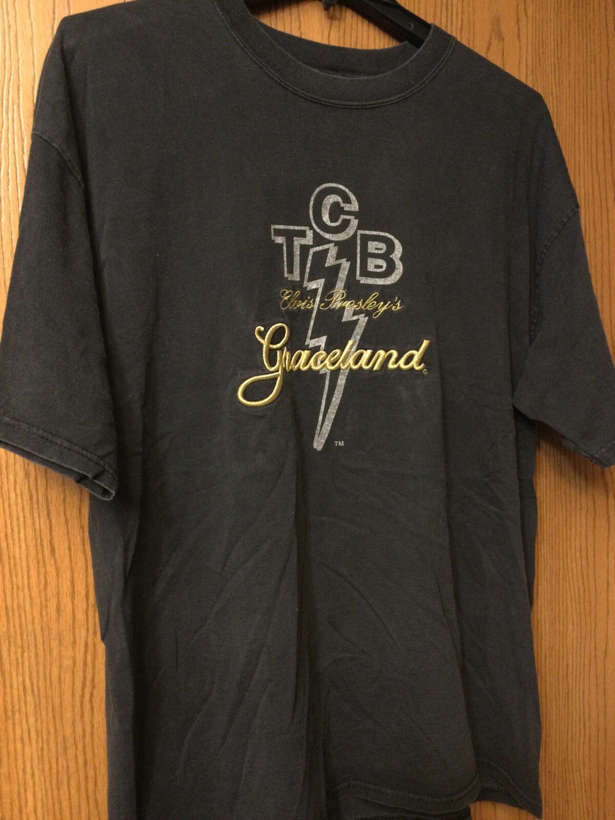 Elvis Presley’s Graceland - TCB - Black Shirt. - Gem