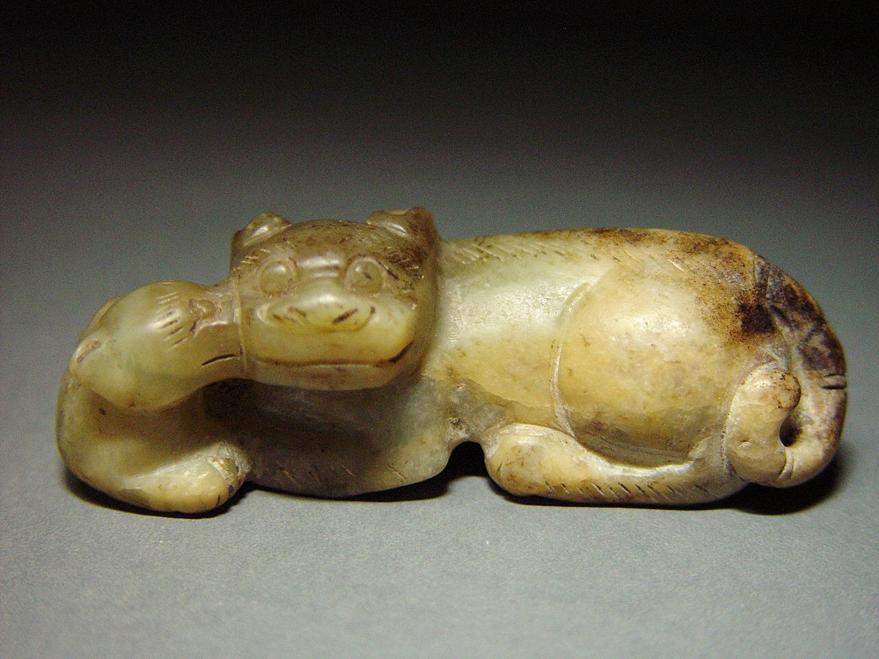 ANTIQUE CHINESE JADE CARVING OF RECUMBENT DOGS, PENDANT. MING DYNASTY ...