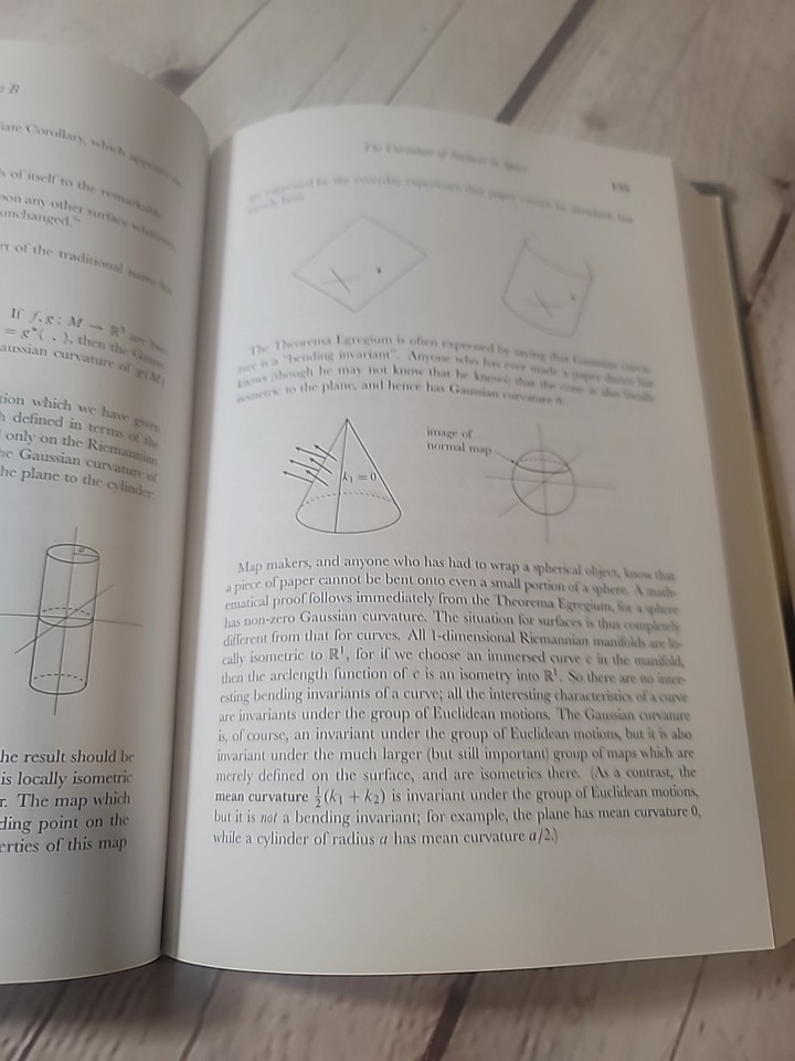 A COMPREHENSIVE INTRODUCTION TO DIFFERENTIAL GEOMETRY, By Michael ...