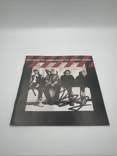 U2 how to determine an atomic bomb Signed Cd Cover Autographed W/COA ...