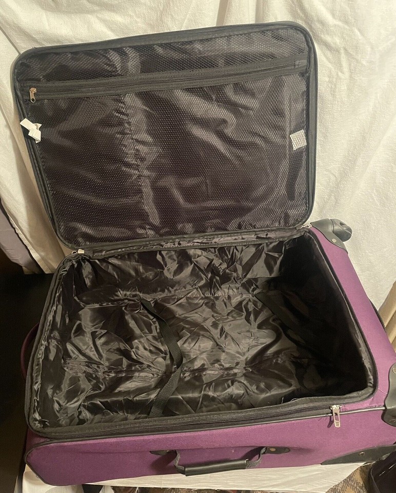 Purple Prodigy Large 28” Suitcase 4 Wheels Great Condition! | eBay
