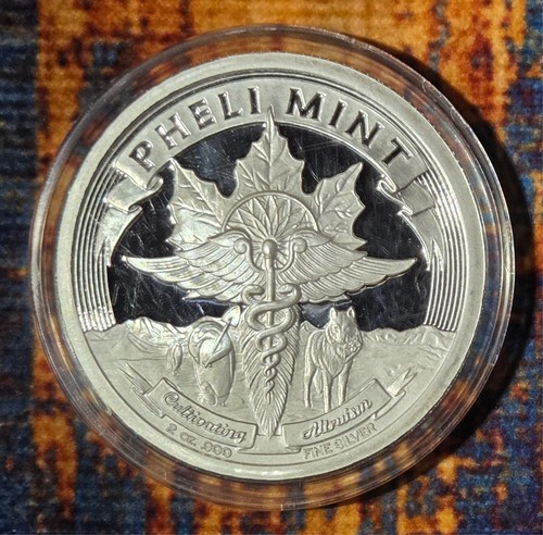 TWO WOLVES 2 oz 999 Fine Silver Round PHELI MINT Which One Do YOU Feed ...