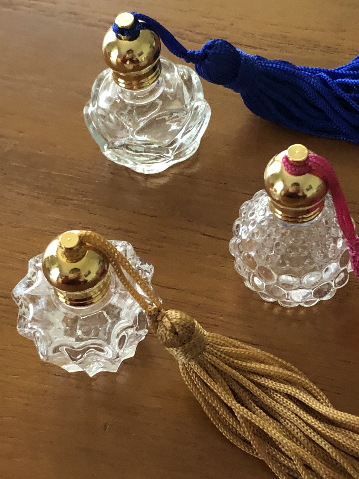 Three Cute mini perfume bottles with Tassels In Various Clear Glass ...