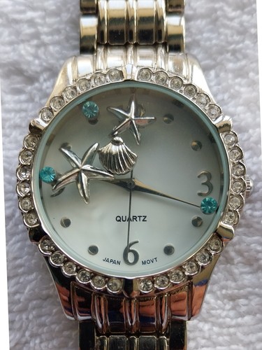 avon enchanting sea watch with floating loose charms | eBay