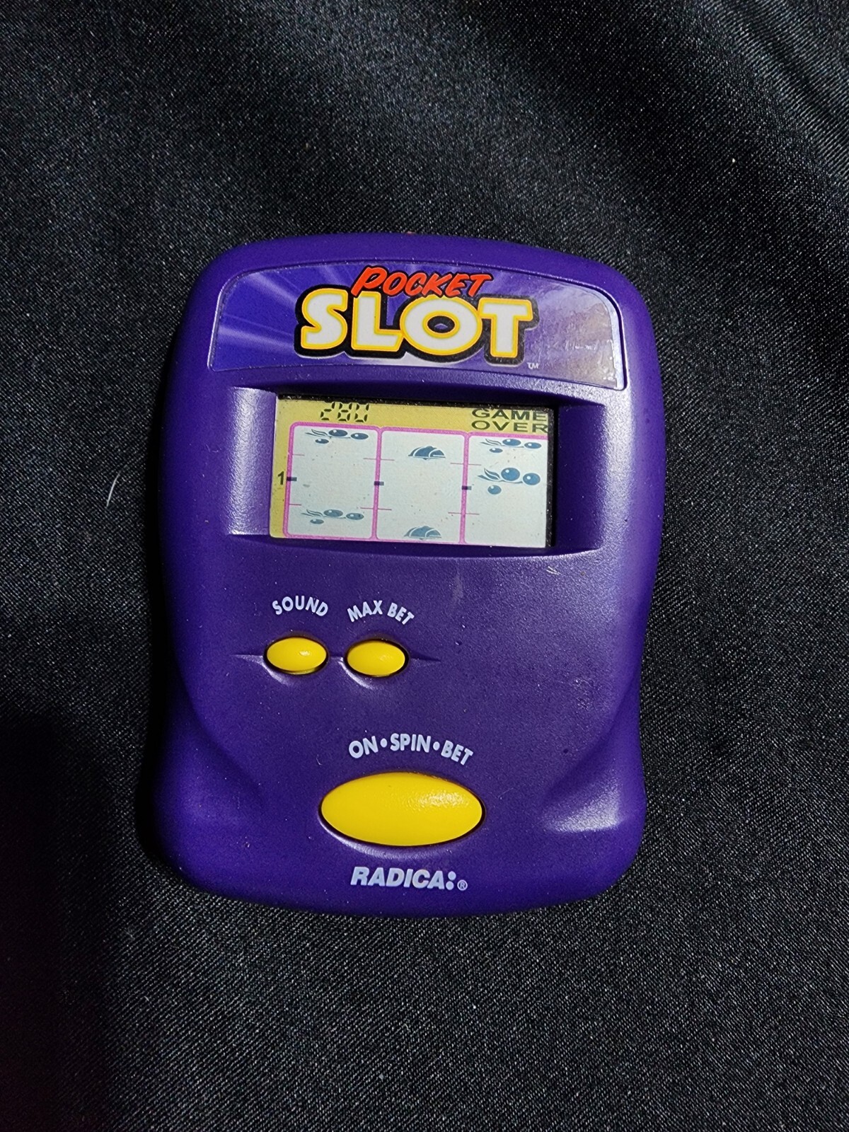 Radica Purple Pocket Slot Electronic Handheld Game Slot Machine Game ...