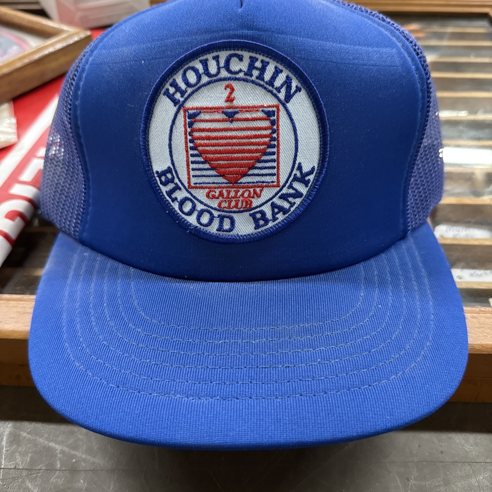 Houchin. Blood Bank, 2 Gallon Club Ball Cap - Gem
