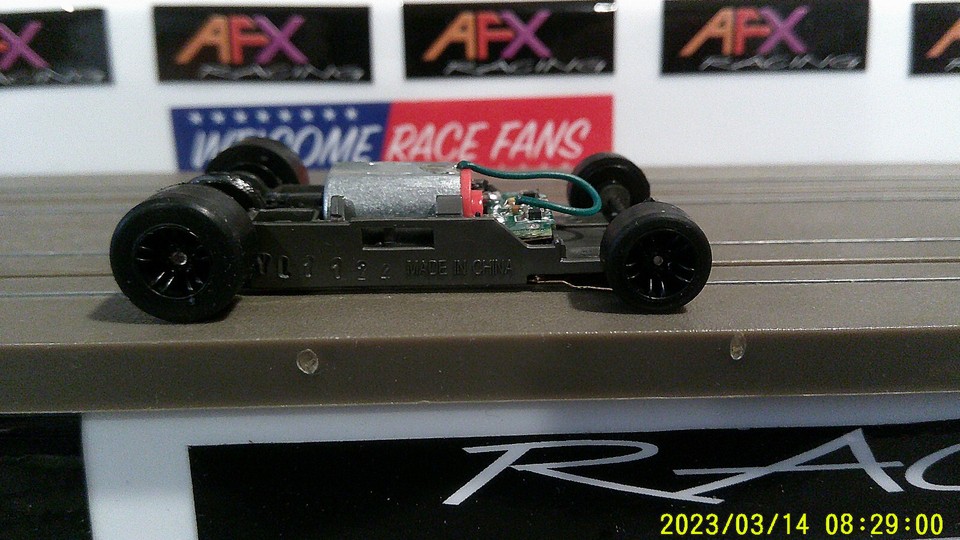 AFX RACING H.O. SCALE MEGA G+ 1.7 NARROW CHASSIS BLACK IN-LINE STYLE ...