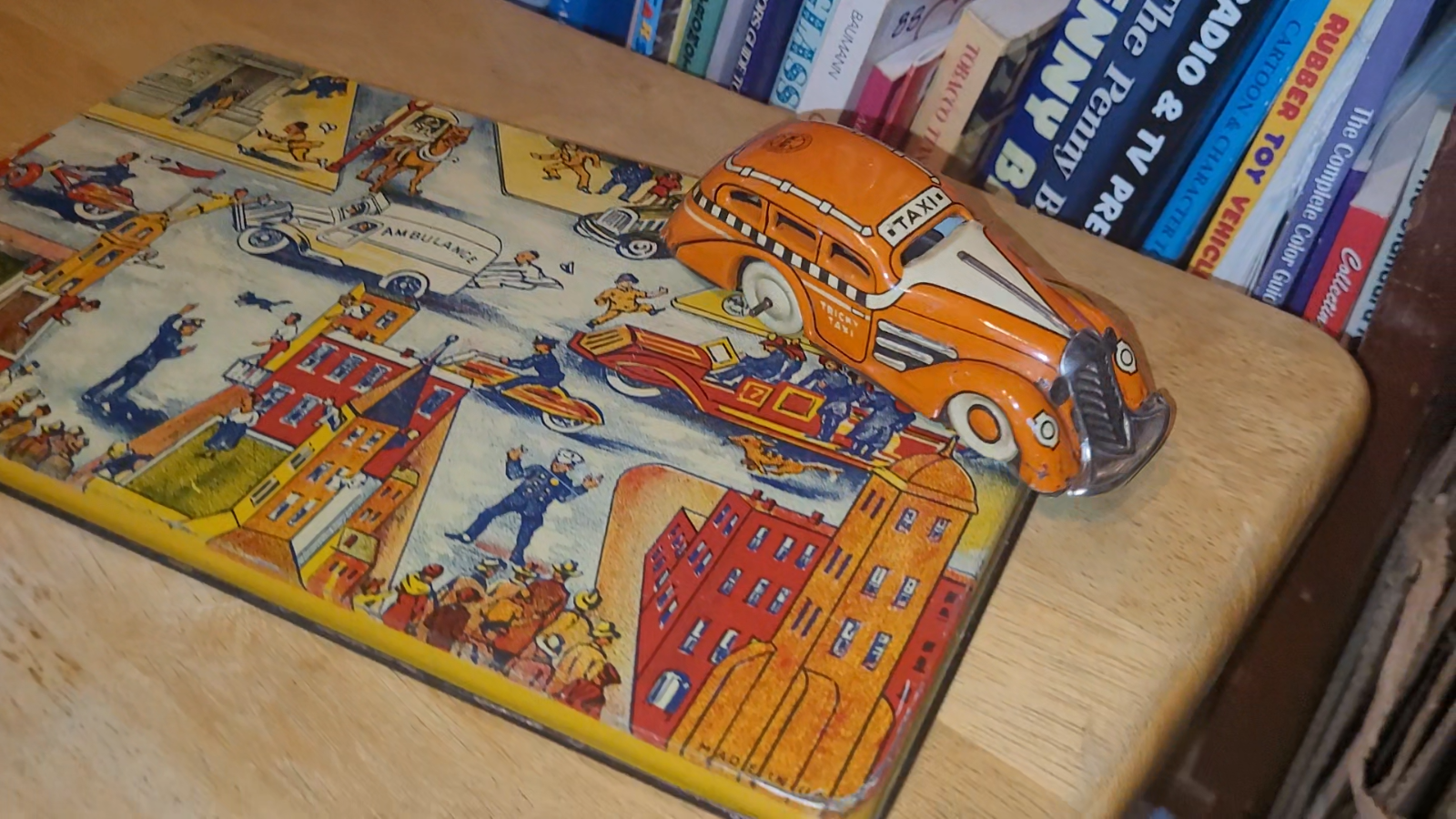 VINTAGE 1930'S MARX TIN LITHO ORANGE WIND UP TRICKY TAXI with TIN BUSY ...