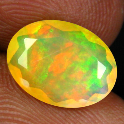 1.52 ct Topnotch Oval (11 x 8 mm) Un-Heated Ethiopia Rainbow Opal Loose ...