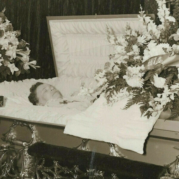 Lady In Casket