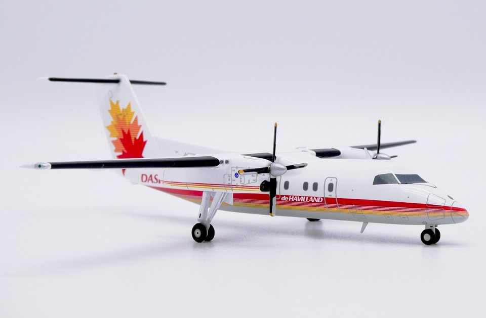DE HAVILLAND CANADA DASH 8-Q100 REG: C-GGPJ WITH STAND- JC WINGS ...