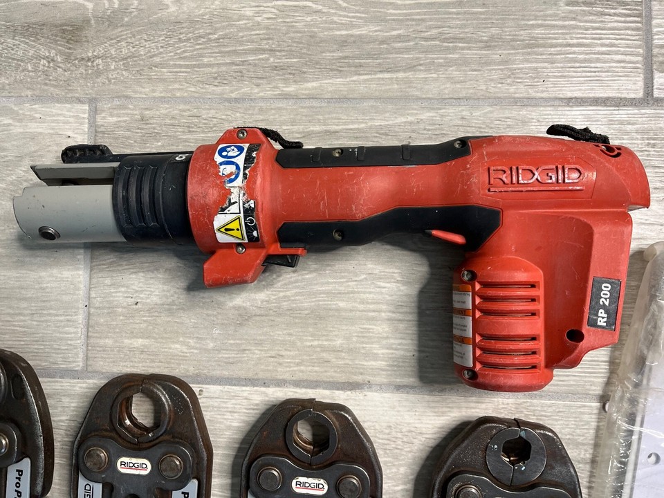 Ridgid RP 200-B Compact press tool 1 battery 1 charger 4 jaws, and the ...