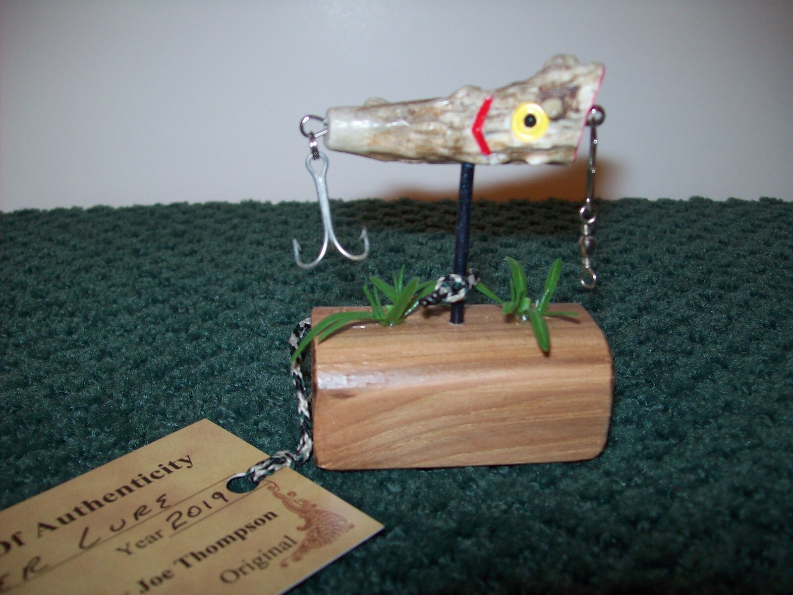 COLLECTIBLE HAND CARVED DEER ANTLER FISHING LURE ON WOOD DISPLAY BASE ...